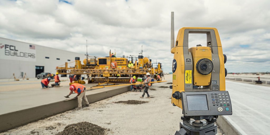 Total station machine control for construction equipment